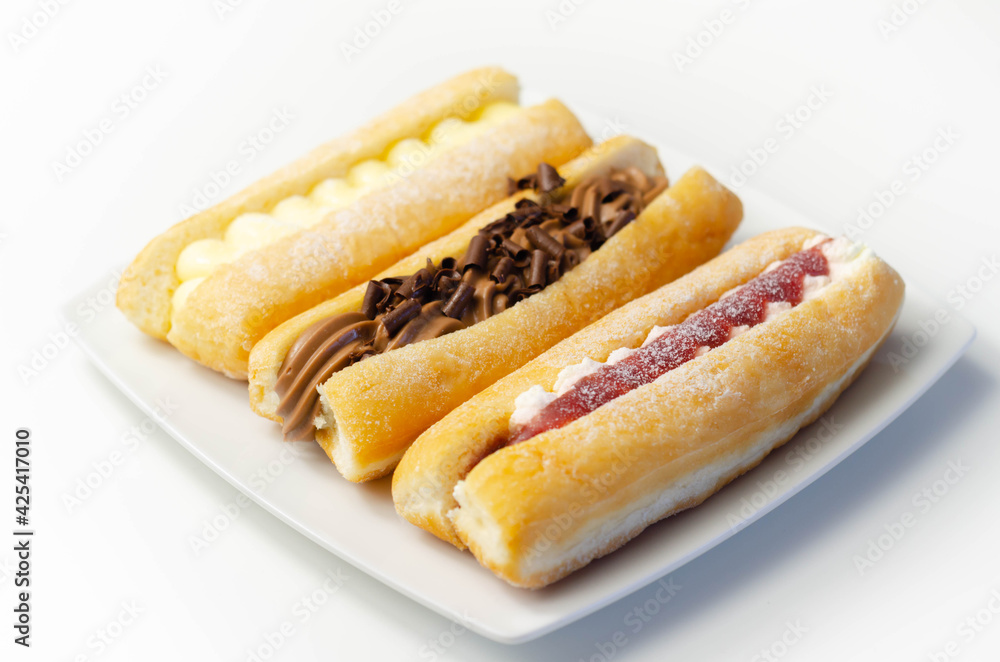 Mixed finger donuts filling chocolate, custard, jam and whipped cream ...