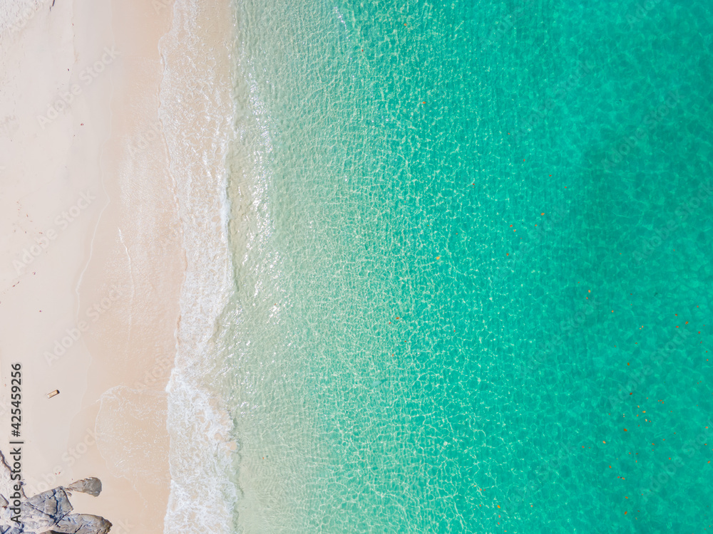Aerial view nature summer sea waves in top-down drone shot perspective ...