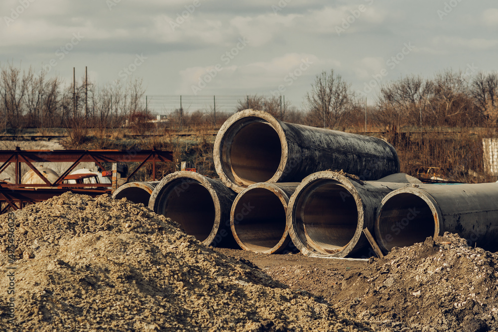 sewer, concrete pipes. concrete pipes on a large storage area. They are ...