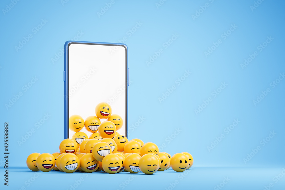 Smartphone with blank screen and heap of yellow smile emoji over blue ...