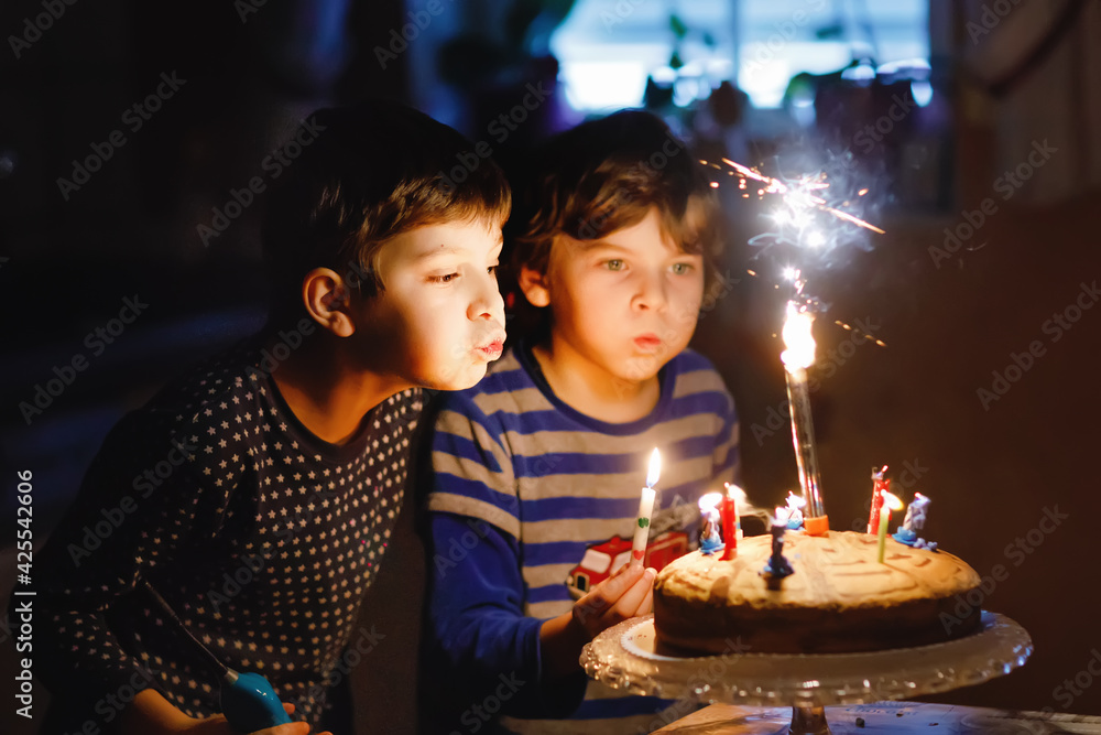 Two beautiful kids, little preschool boys celebrating birthday and ...