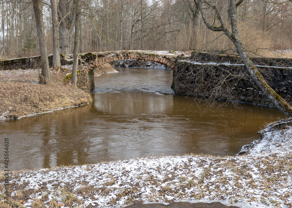 a continuous boulder stone bridge with a brick used for masonry, early ...