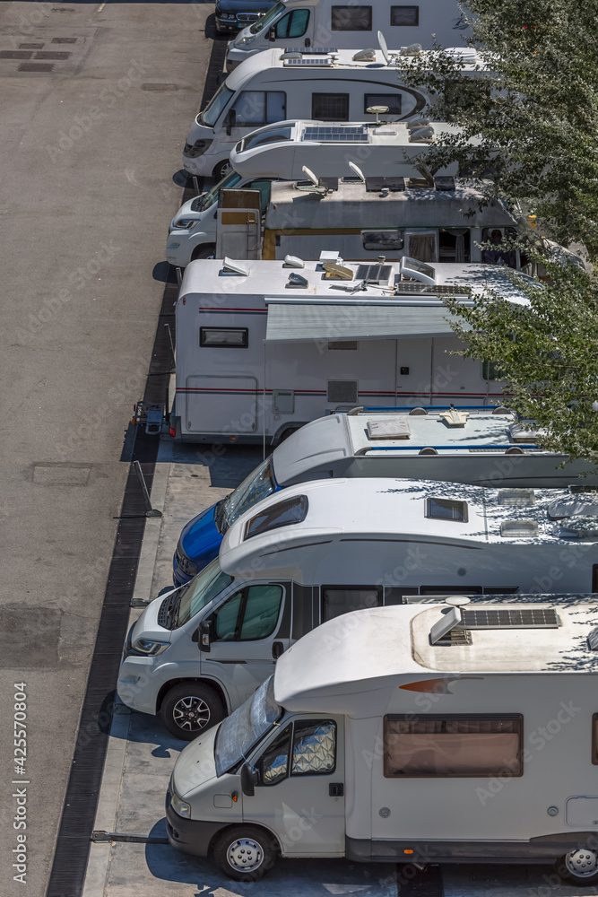 View of a car park with motorhomes parked, different models of vehicle ...