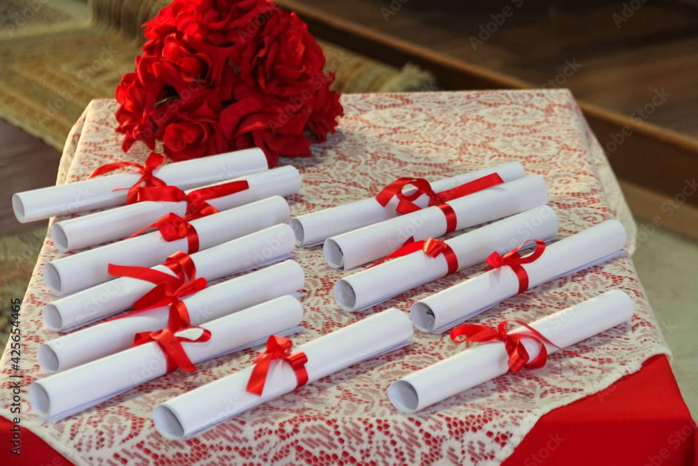 Diplomas and certificates of graduation and completion of course rolled ...