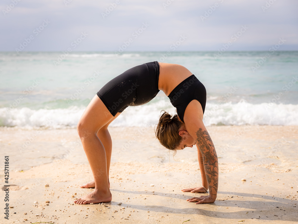 Outdoor Yoga Caucasian Woman Practicing Chakrasana Or Urdhva