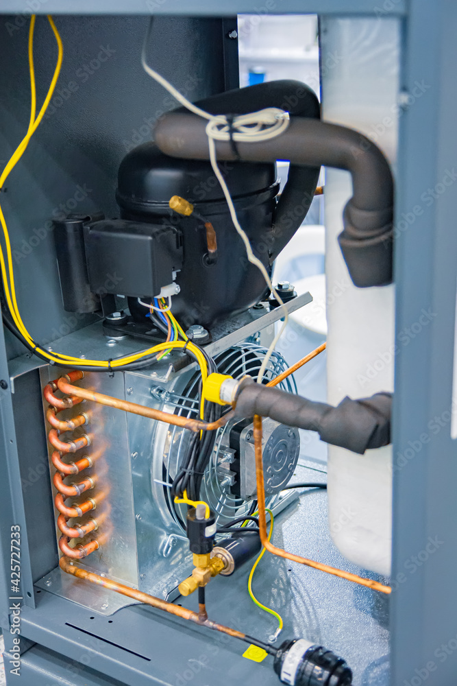 Compressor cooling system. Fan and copper pipes Stock Photo | Adobe Stock