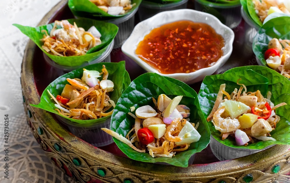 Betel Leaf Wrap or Miang kham before wrapping . Snack food that ...