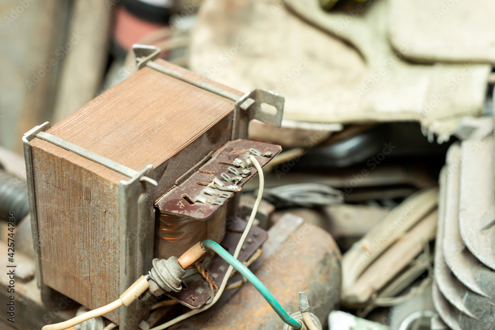 Old non-working disassembled transformer in the garage. Stock Photo ...