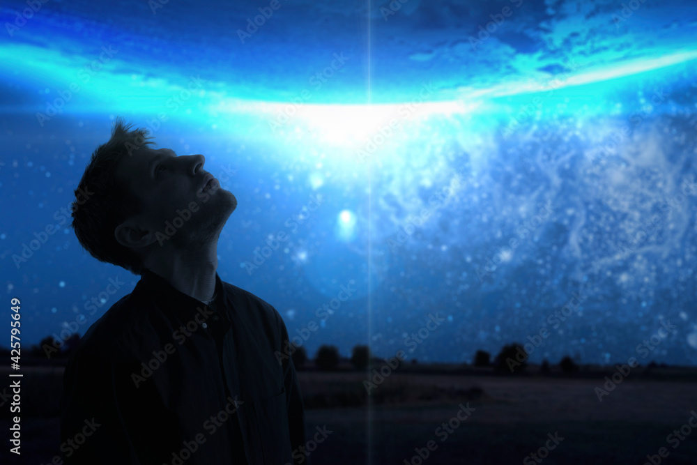 man watching the night sky, looking up, stars of milky way galaxy ...