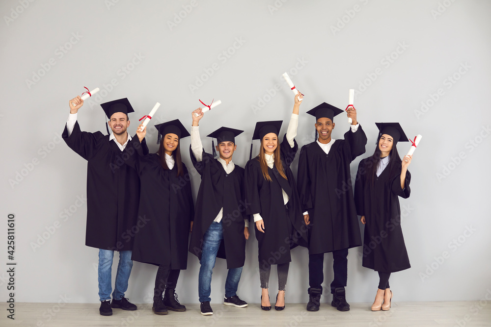 Successful univesity graduation, multiethnic group concept. Group of ...