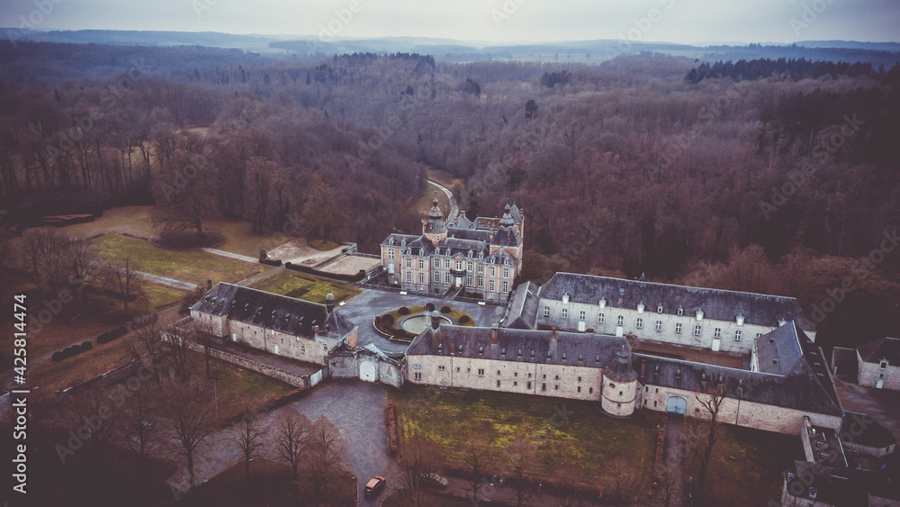 Aerial view of Modave Castle (Château de Modave) and its dependencies ...