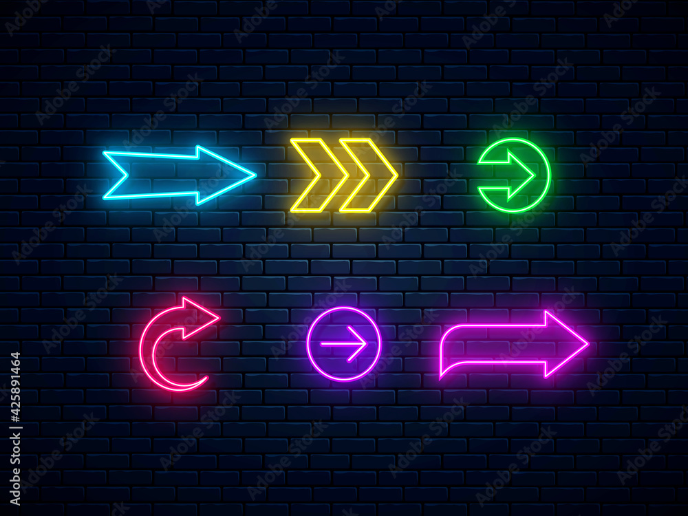 Neon arrow signs collection. Bright arrow pointer symbols on brick wall ...
