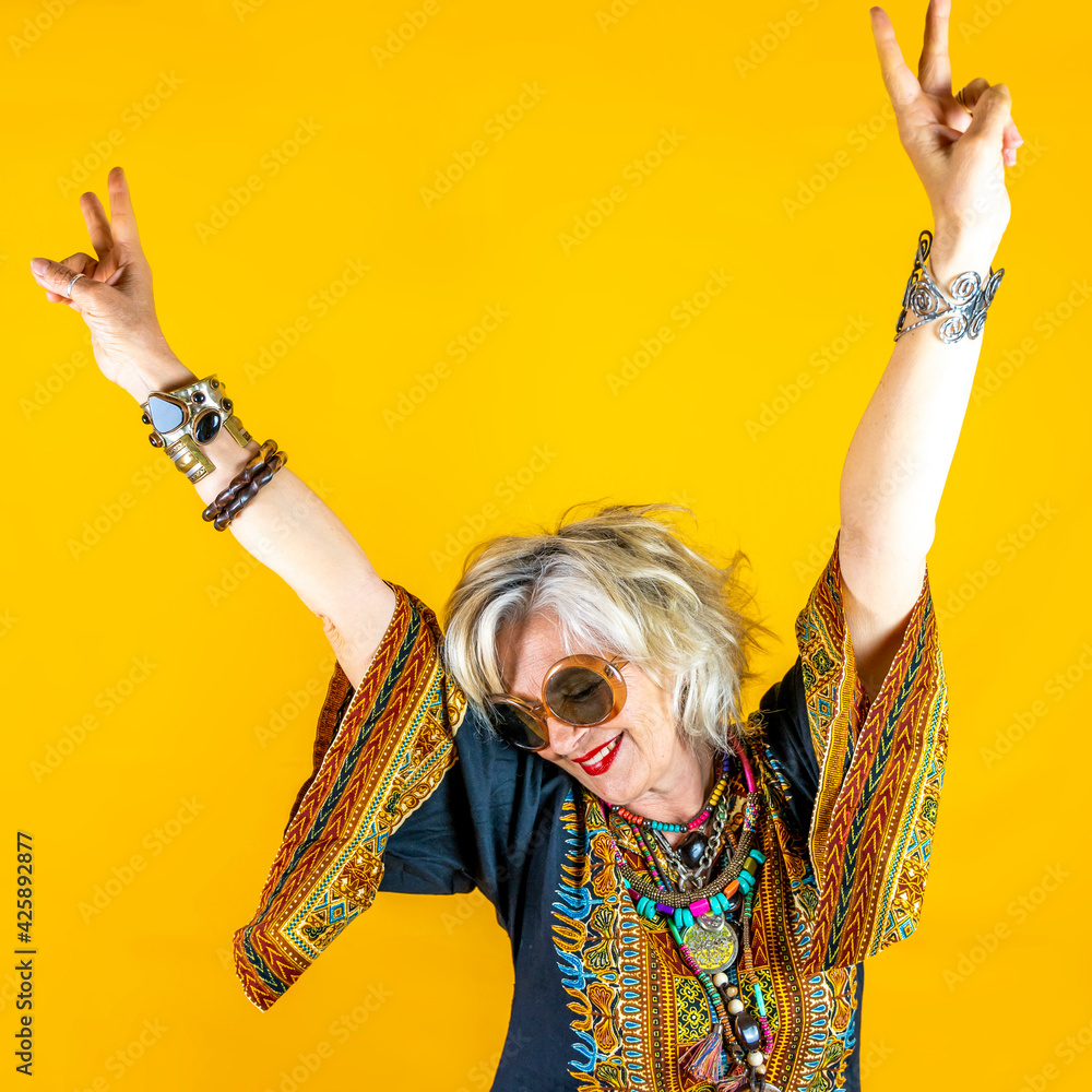 Funny portrait of mature woman. Beautiful lady have fun dressed with ...