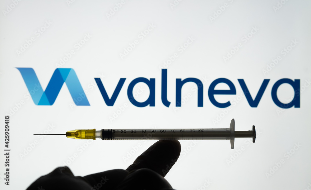 Valneva COVID-19 vaccine concept. Syringe and Valneva company logo on ...