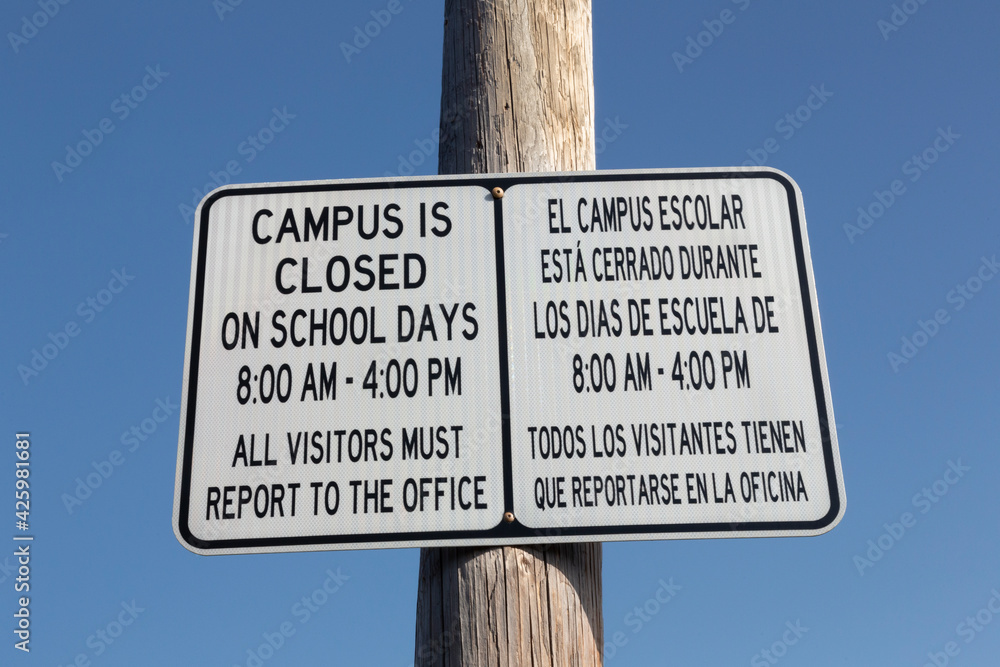 Campus is Closed On School Days sign, in both English and Spanish ...