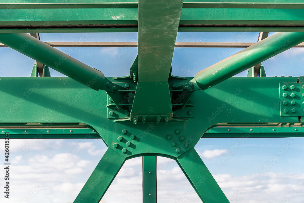 Construction elements of the pedestrian bridge. Steel supports secured ...