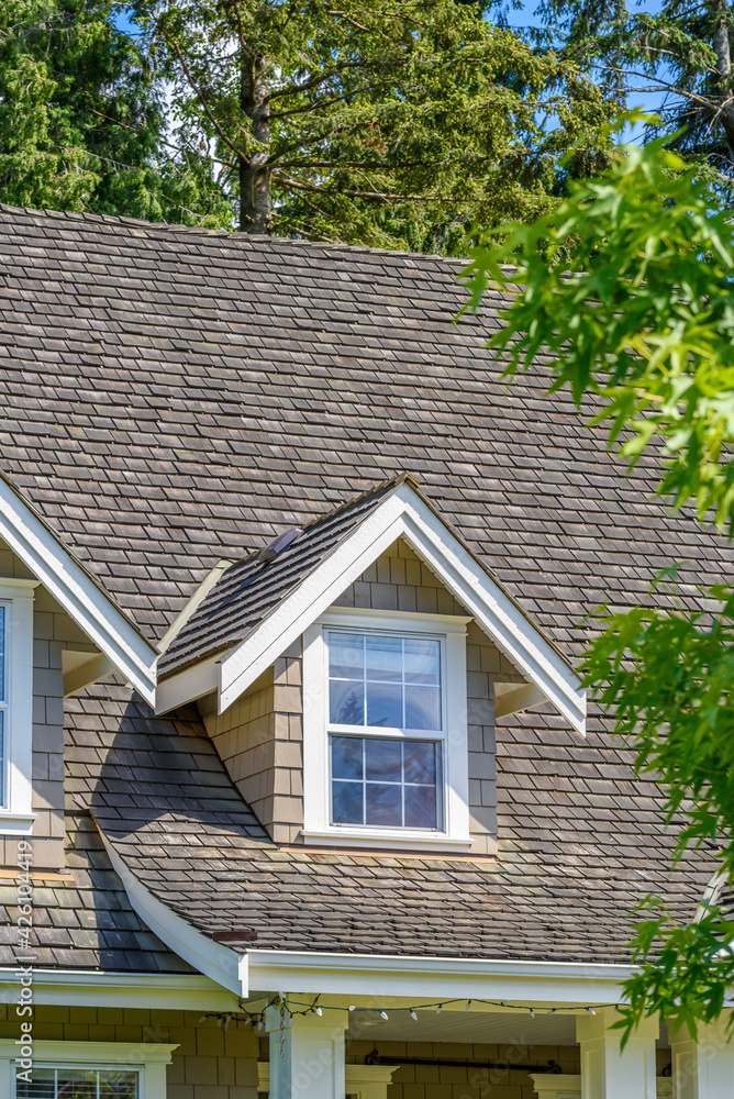 The top of the house or apartment building with nice window. Stock ...