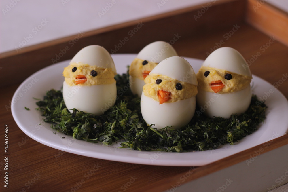Devilled egg chicks prepared as Easter Eggs. Traditional celebration of ...