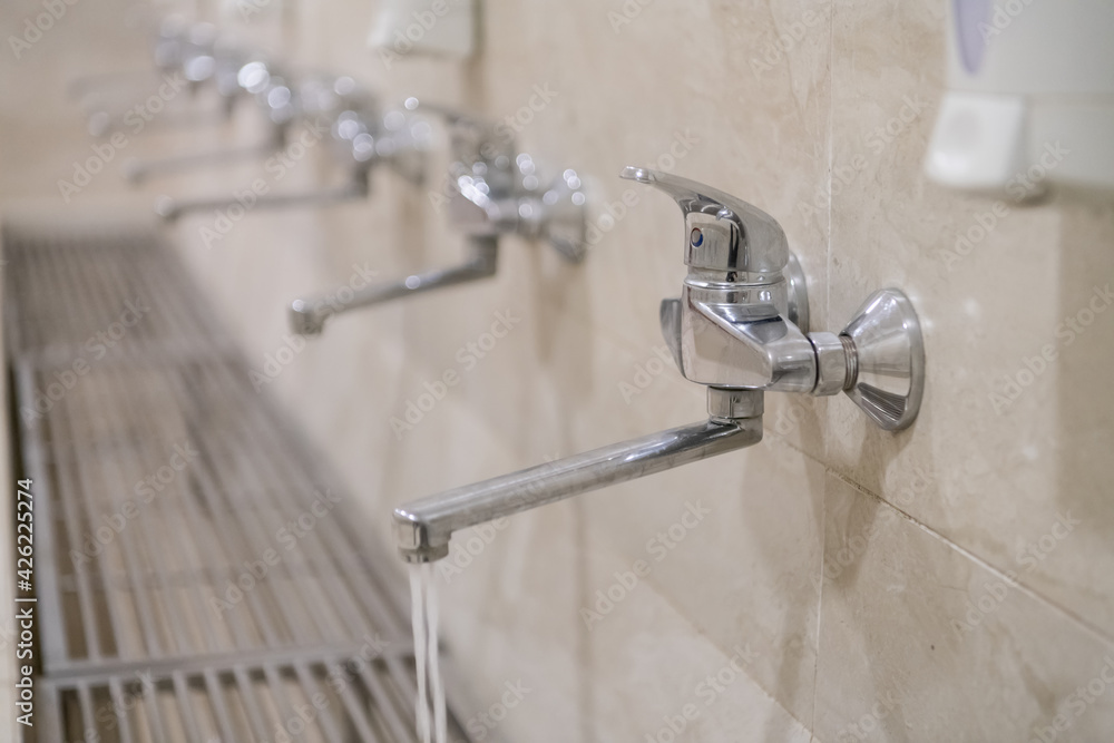 Muslim bath located in the premises of a mosque used for ablution ...