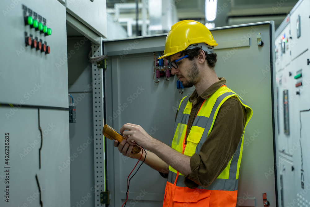 Electrical engineer checking status switchgear electrical energy ...