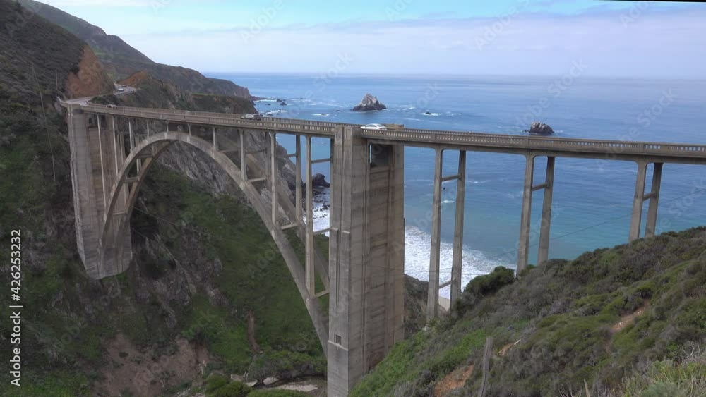 The Bixby Creek Bridge, a scenic open-spandrel arch bridge completed in ...