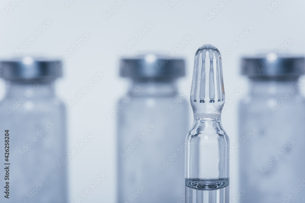Glass medical ampoule vial for injection. Medicine is liquid sodium ...