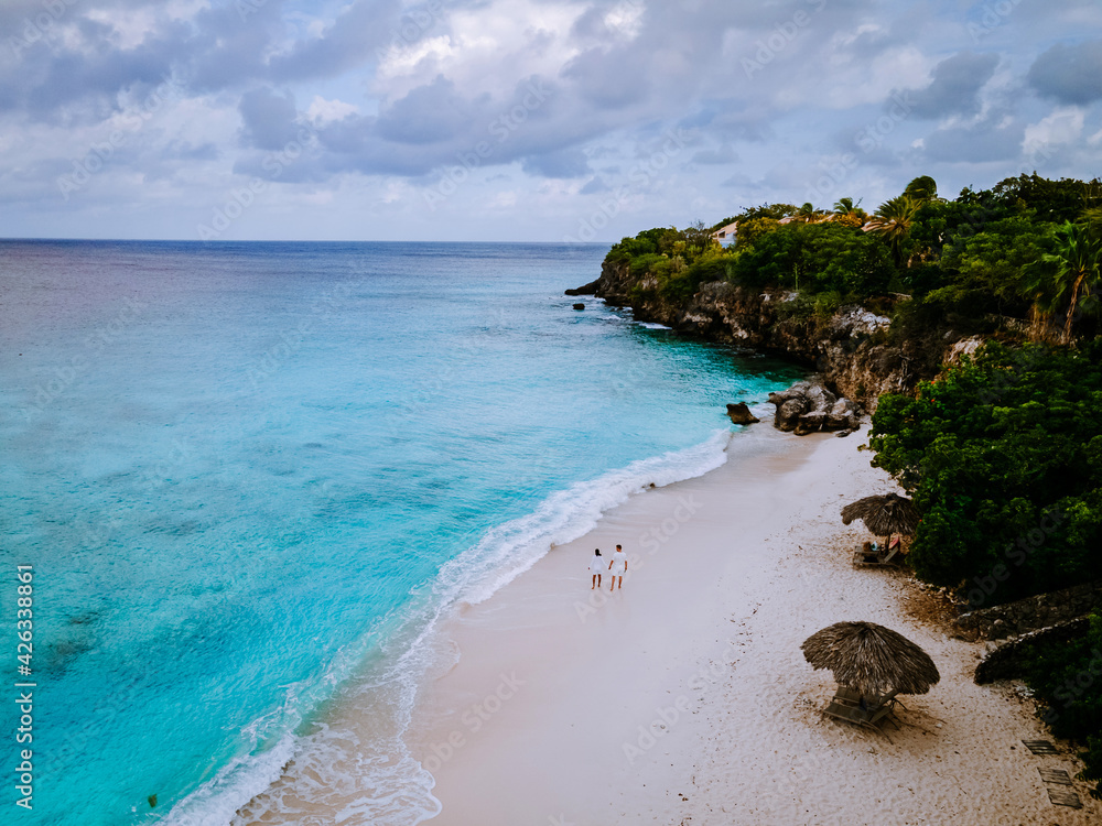 Beach and Pier at playa Kalki in Curacao, tropical beach from the sky ...