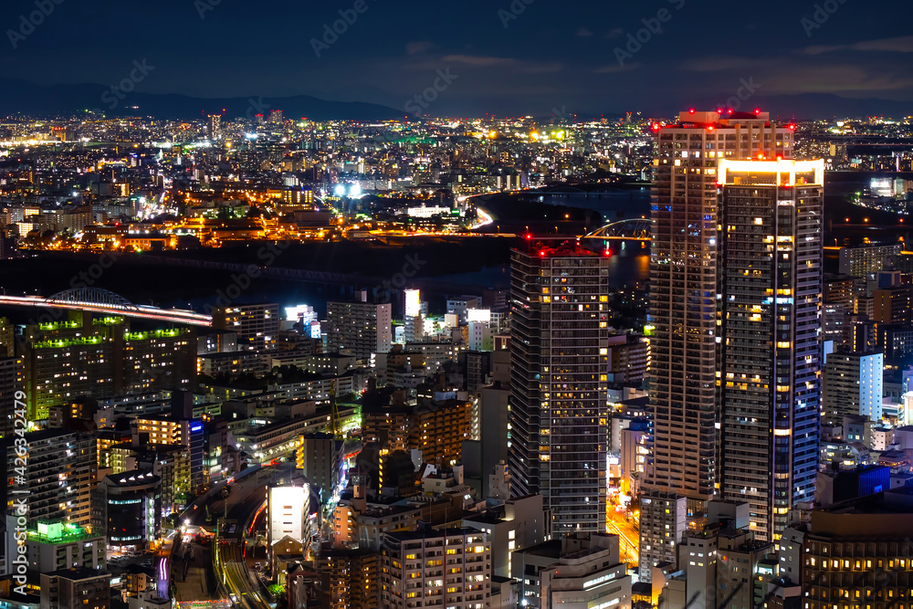 Japan. Night panorama of Osaka. Evening Osaka aerial view. Lights of ...