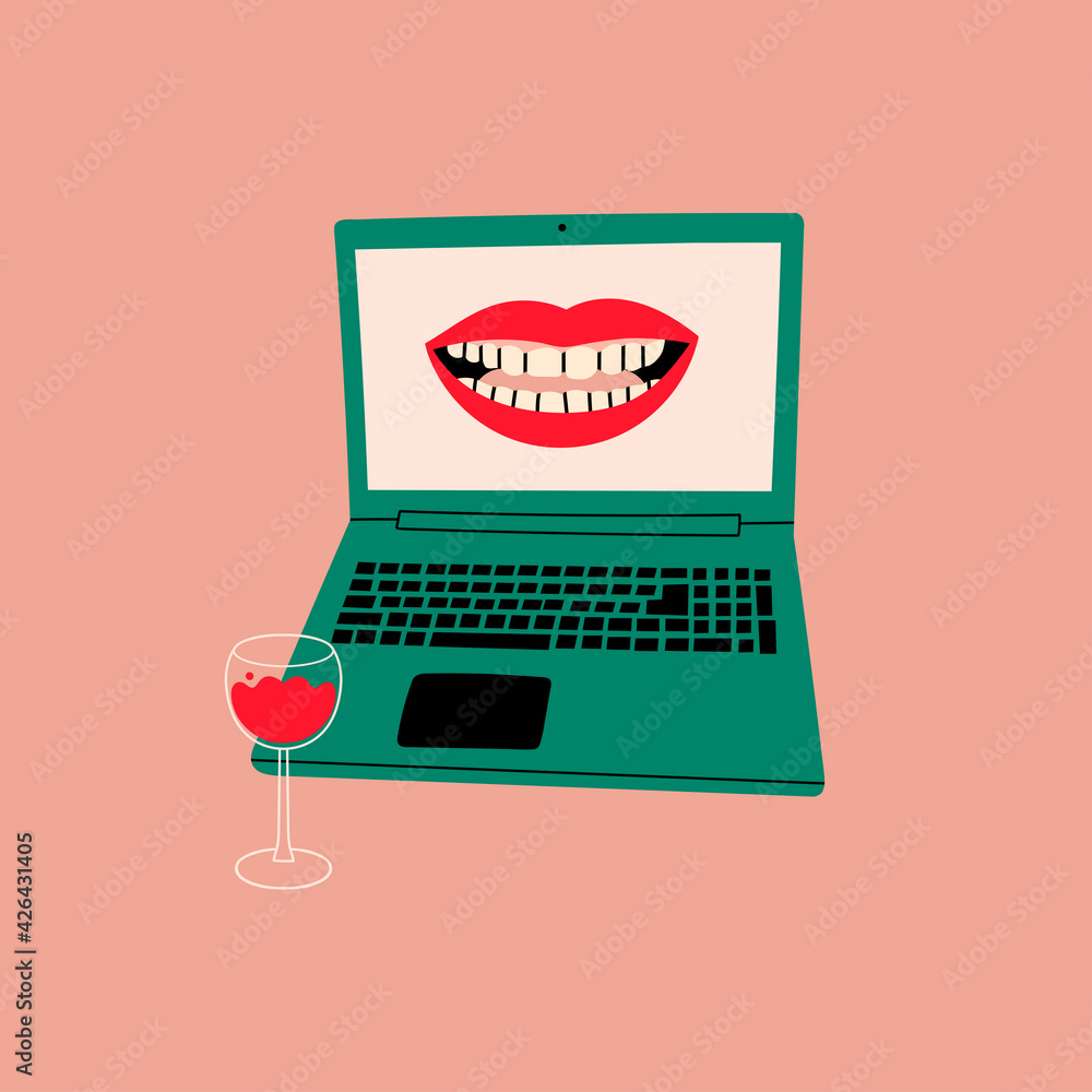 Laptop with smiling mouth on screen. Wine glass standing near the ...