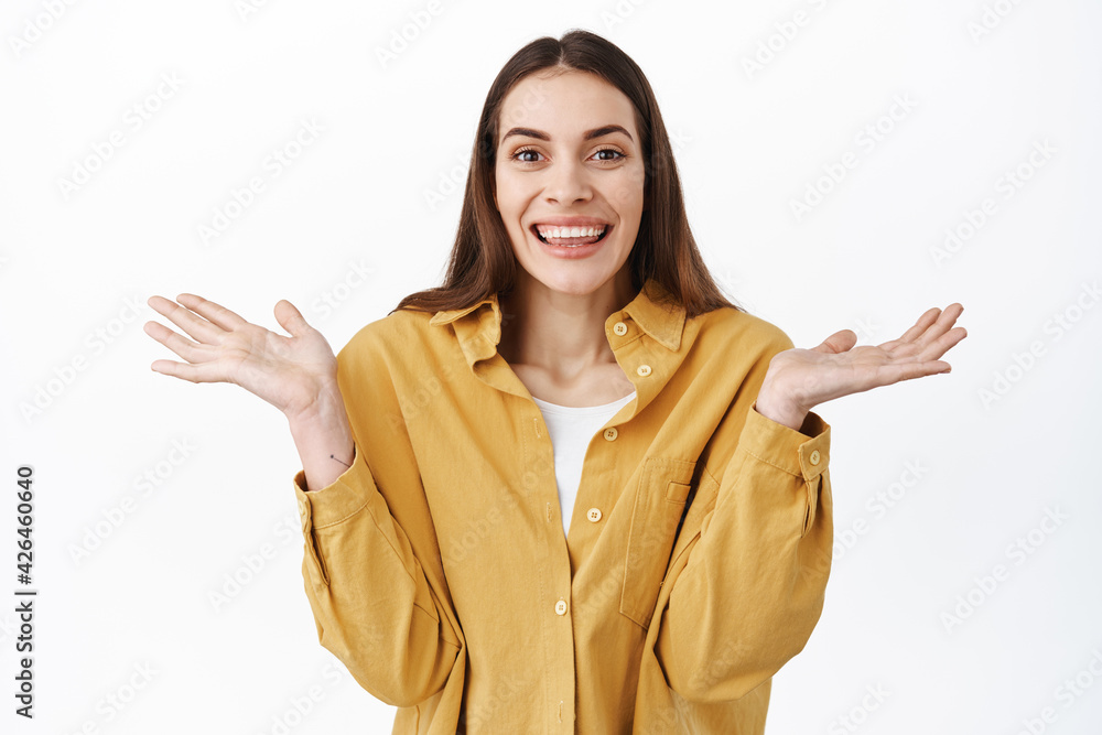 Image of attractive natural girl feeling pleased and happy, clap hands ...