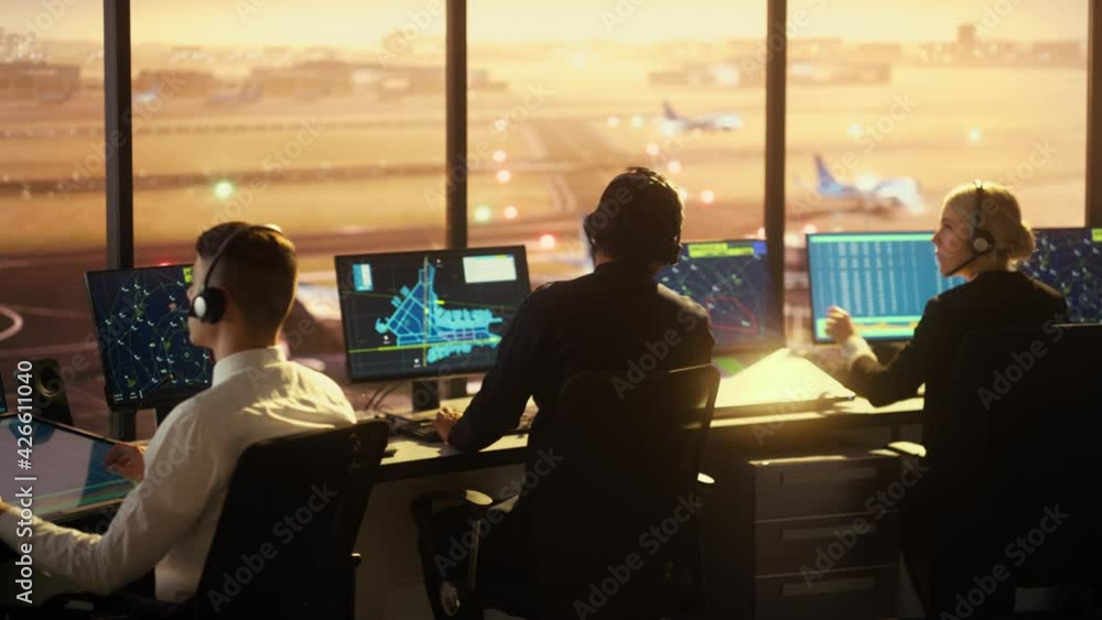 Diverse Air Traffic Control Team Working in a Modern Airport Tower at ...