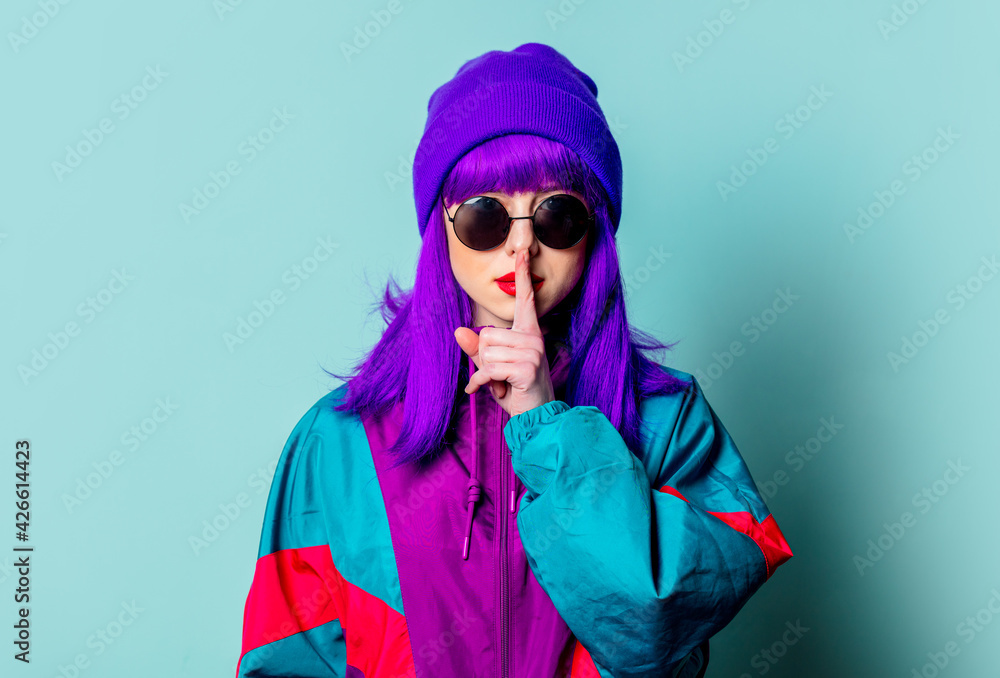Stylish white girl with purple hair, 80s tracksuit and sunglasses show ...