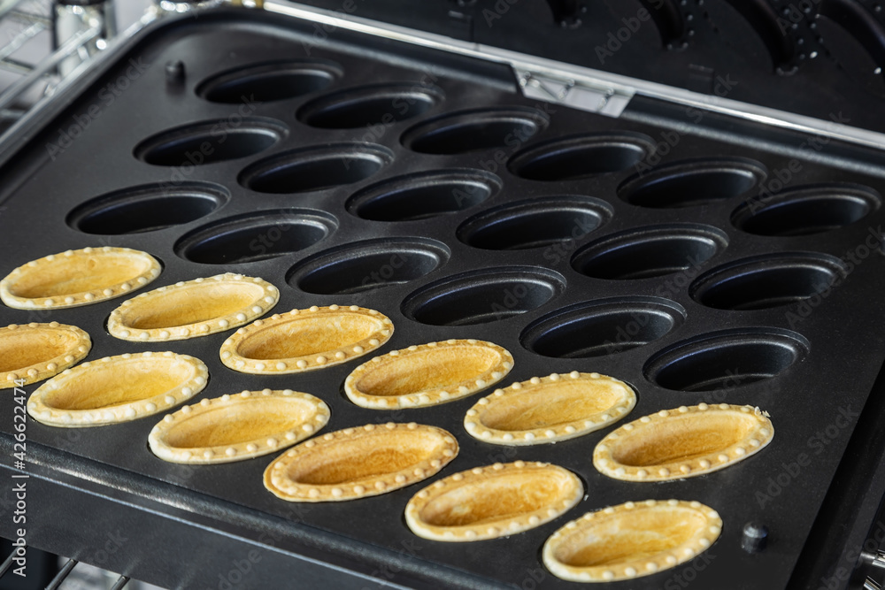 shapes for baking cookies and waffles in a pastry shop Stock Photo ...