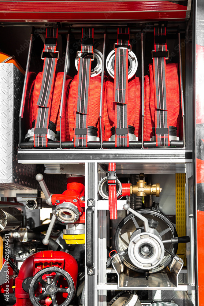 Red and yellow modern fire fighter truck equipped with latest orange ...