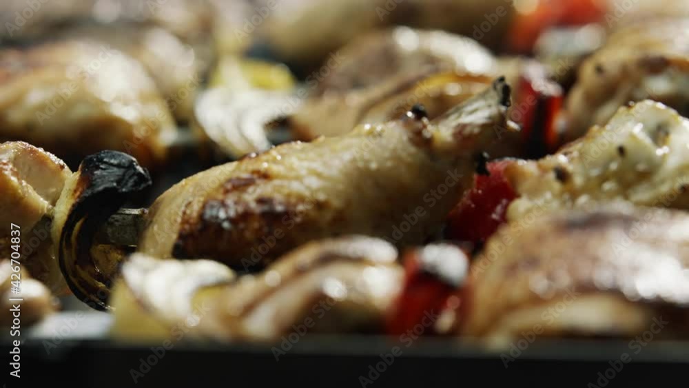 Fried Chicken and Vegetables Flipping Chef on Bbq Close-up. Quail Bird ...