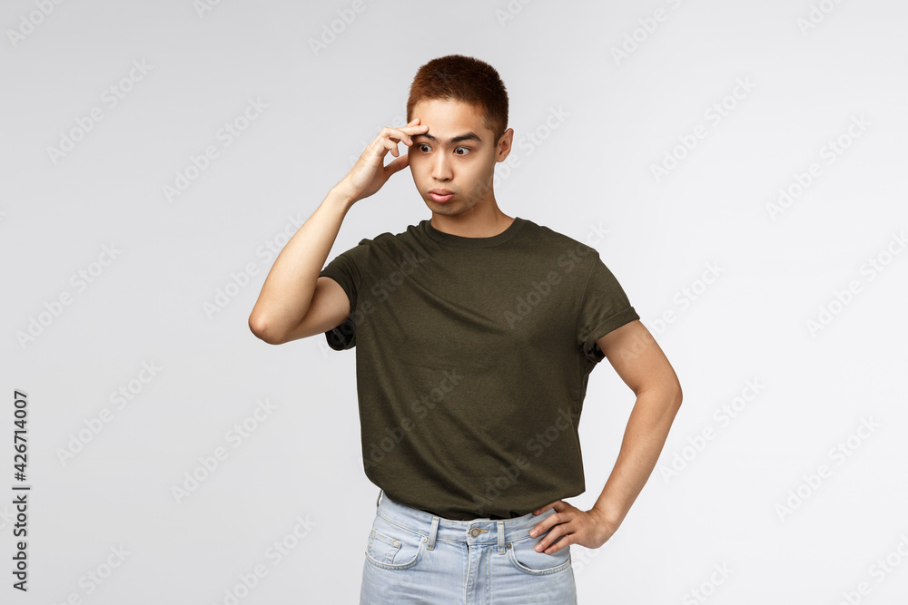Annoyed and distressed, tensed asian guy facepalm, sighing irritated ...