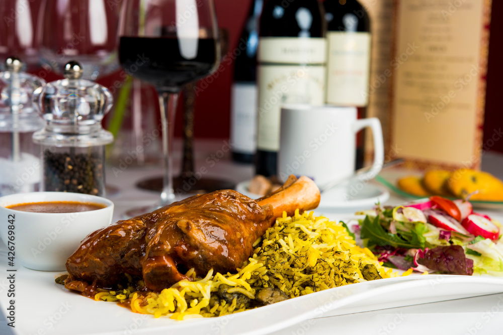 Slow-cooked lamb shanks with herbal rice, Persian Baghali Polo Ba ...