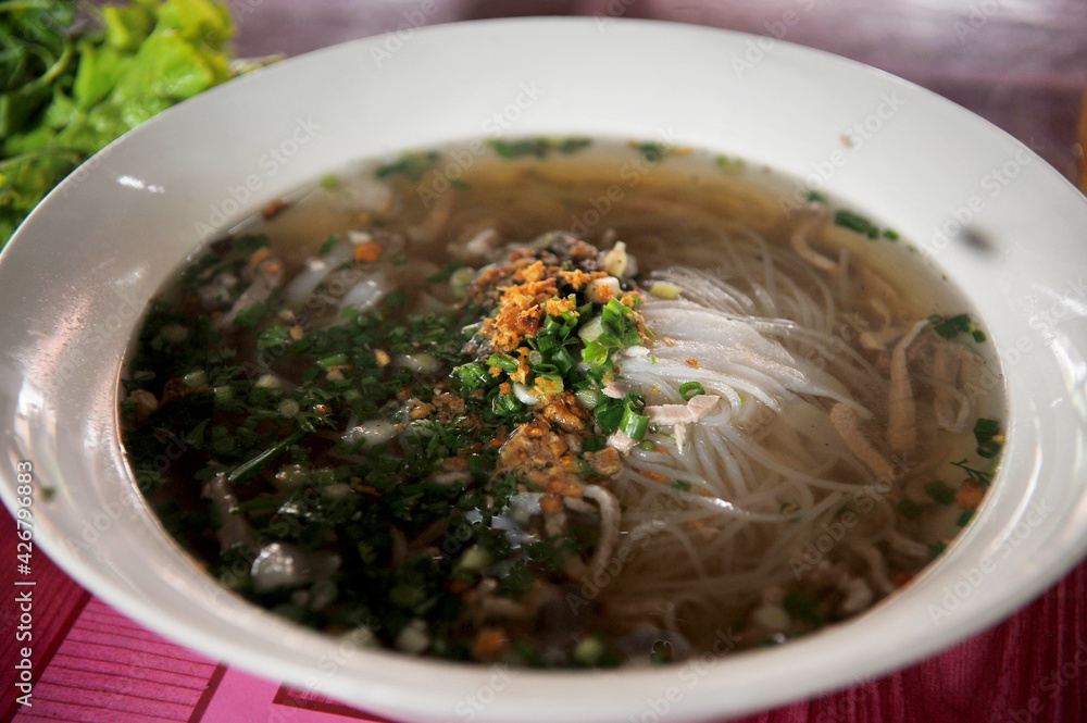 Khao Piak Sen (Lao- style chicken noodle soup). Stock Photo | Adobe Stock