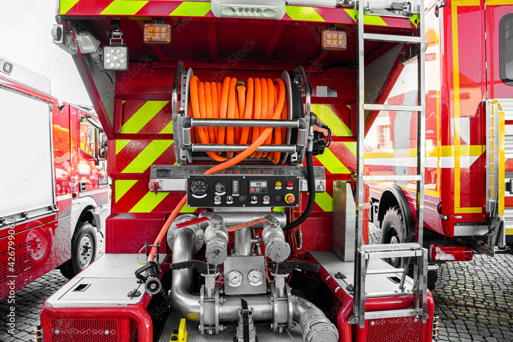 Red and yellow modern fire fighter truck equipped with latest orange ...