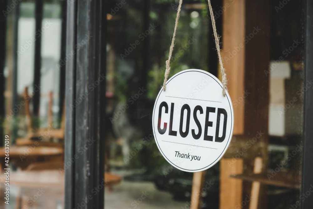 Closed. coffee cafe text on vintage sign board hanging on glass door in ...
