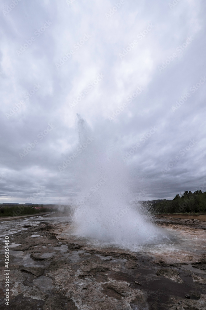 Strokkur geyser is a fountain-type geyser located in a geothermal area ...