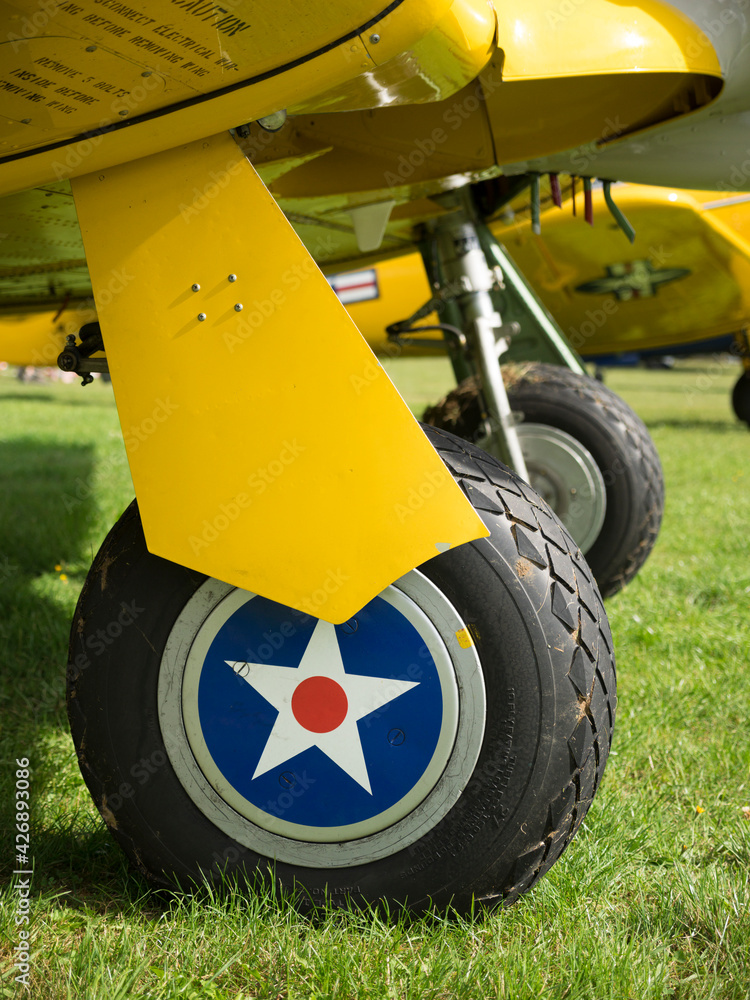 Wheeled retractable landing gear of a classic aircraft Stock Photo ...
