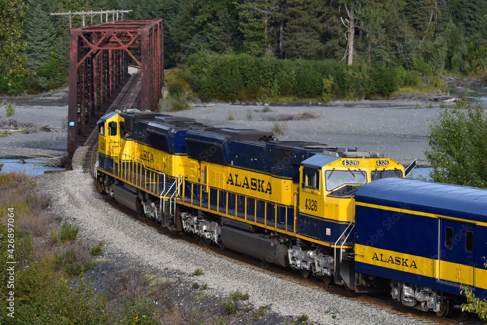 An Alaska Railroad train crosses over the Trail River bridge on the ...
