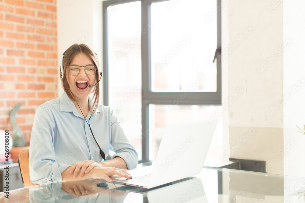 pretty telemarketer shouting aggressively, looking very angry ...