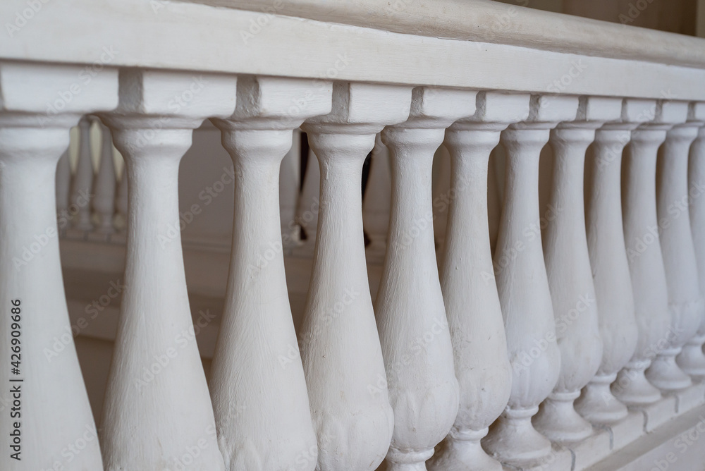 Plaster balustrade railing and stucco wall. Stock Photo | Adobe Stock