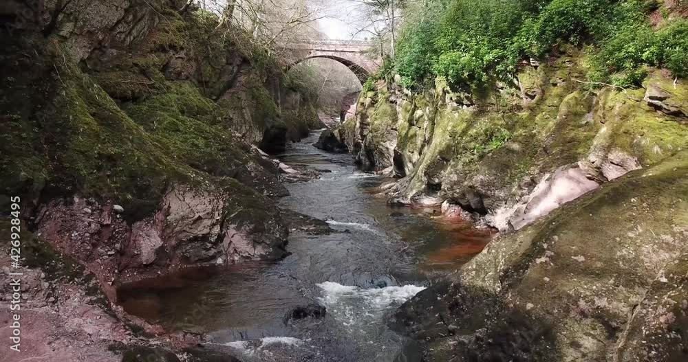 4k aerial footage of gorge and bridge at River North Esk near Edzell ...