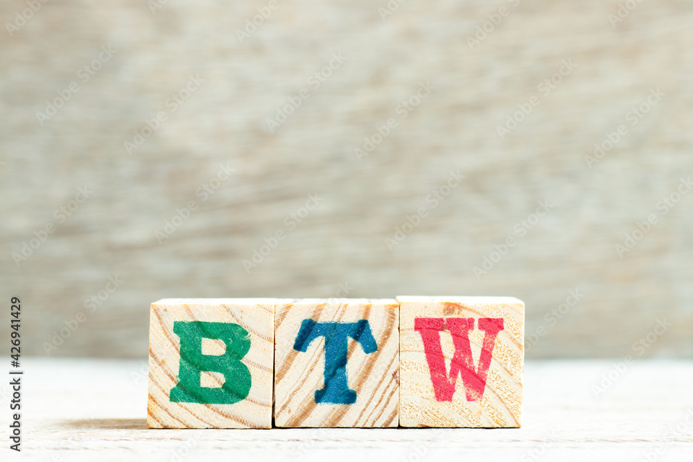 Alphabet letter block in word BTW (Abbreviation of by the way) on wood ...