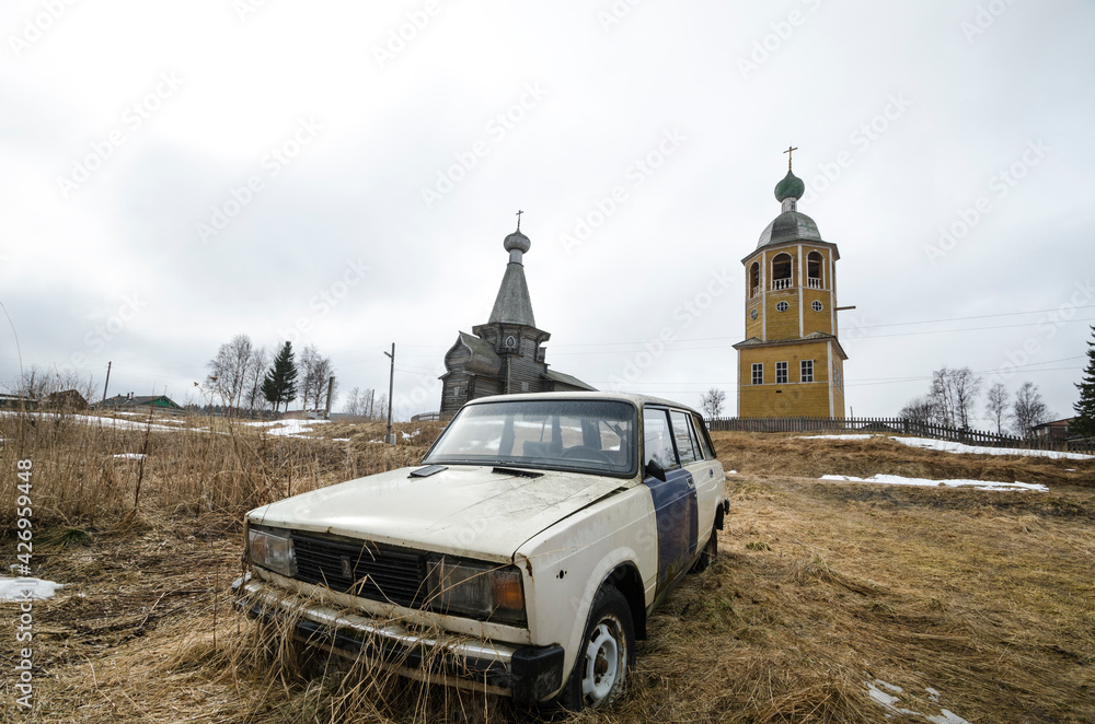 April, 2021 - Nyonoksa. Old Russian rusty cars on the background of ...