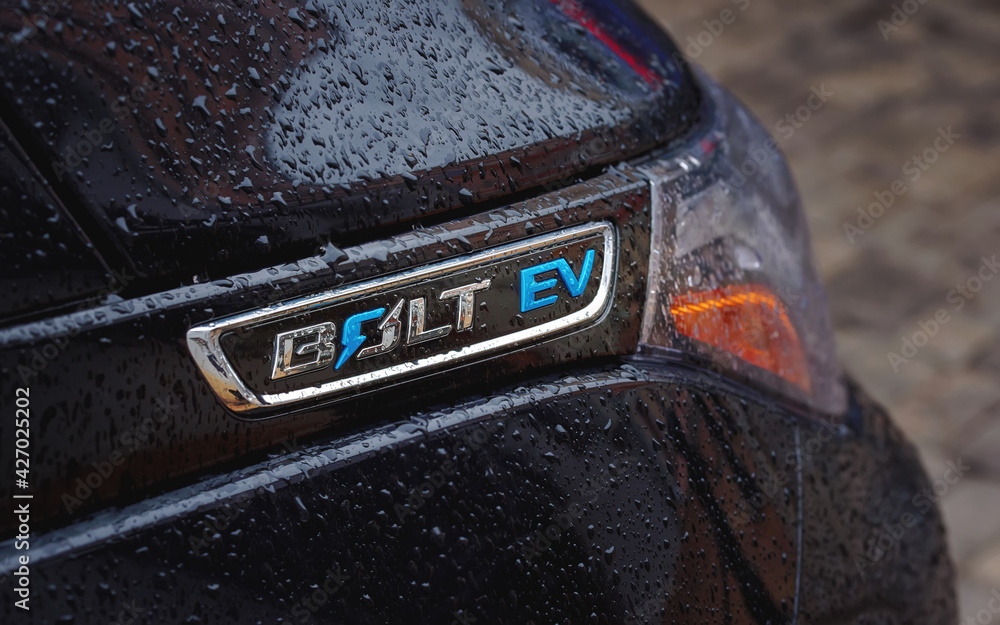 Minsk, Belarus. Mar 2021. Chevrolet Bolt EV car logo with rain drops ...