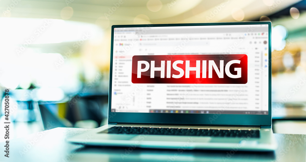 Laptop displaying the sign of phishing on the internet Stock Photo ...